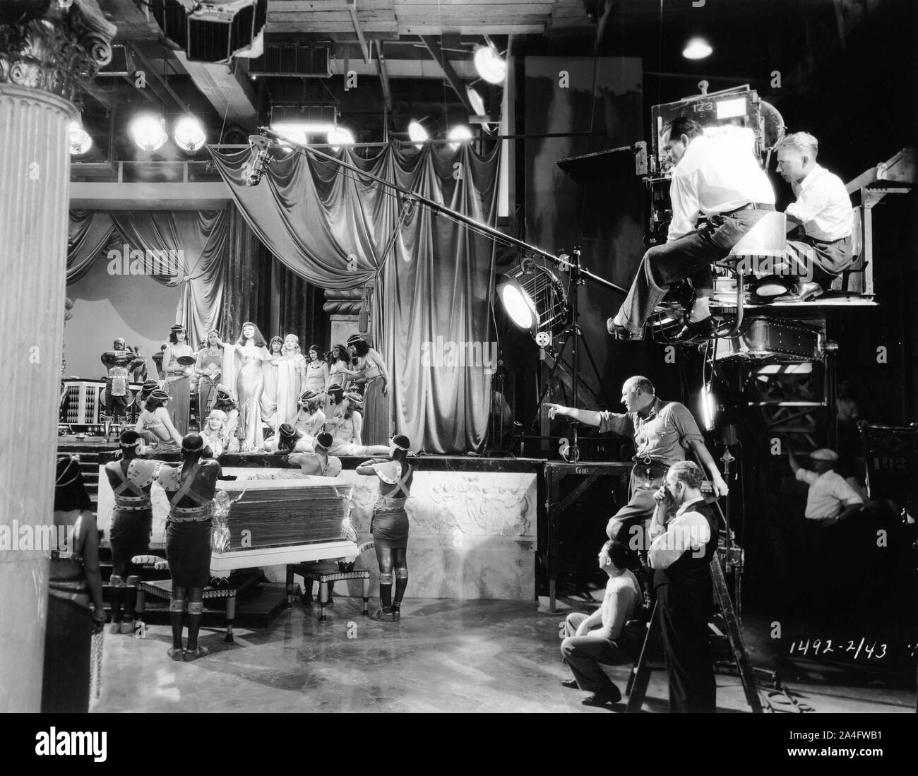 CLAUDETTE COLBERT on set candid filming CLEOPATRA 1934 director CECIL B. DeMILLE cinematographer ...