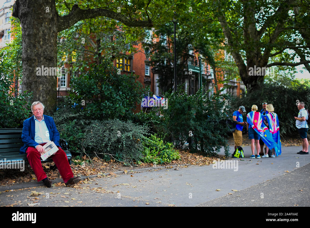 London, UK. Politician Ken Clarke sits on a bench in Victoria Tower ...