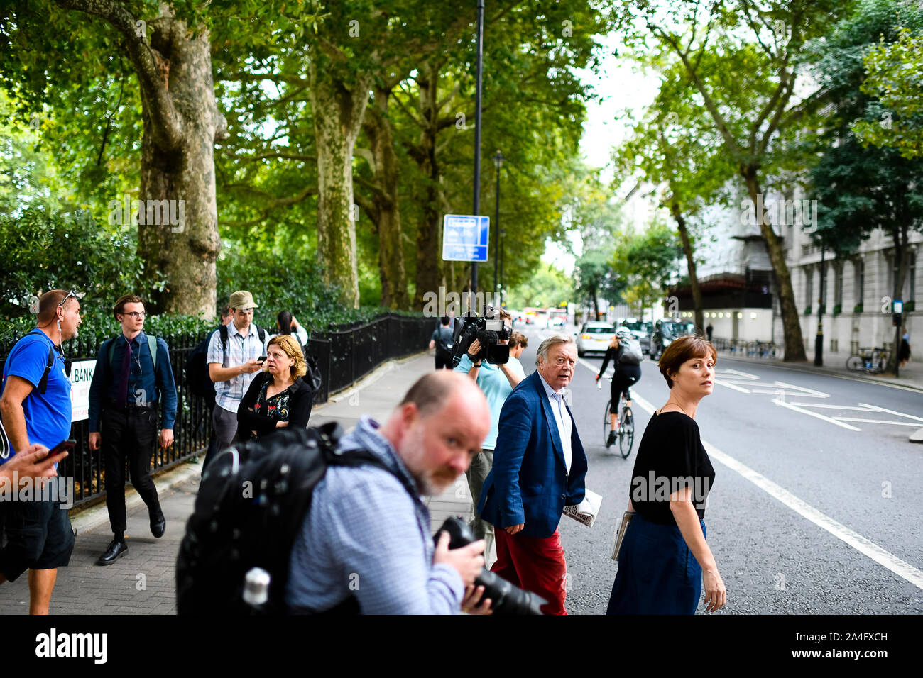 London, UK. Politician Ken Clarke crosses the road outside the Houses ...