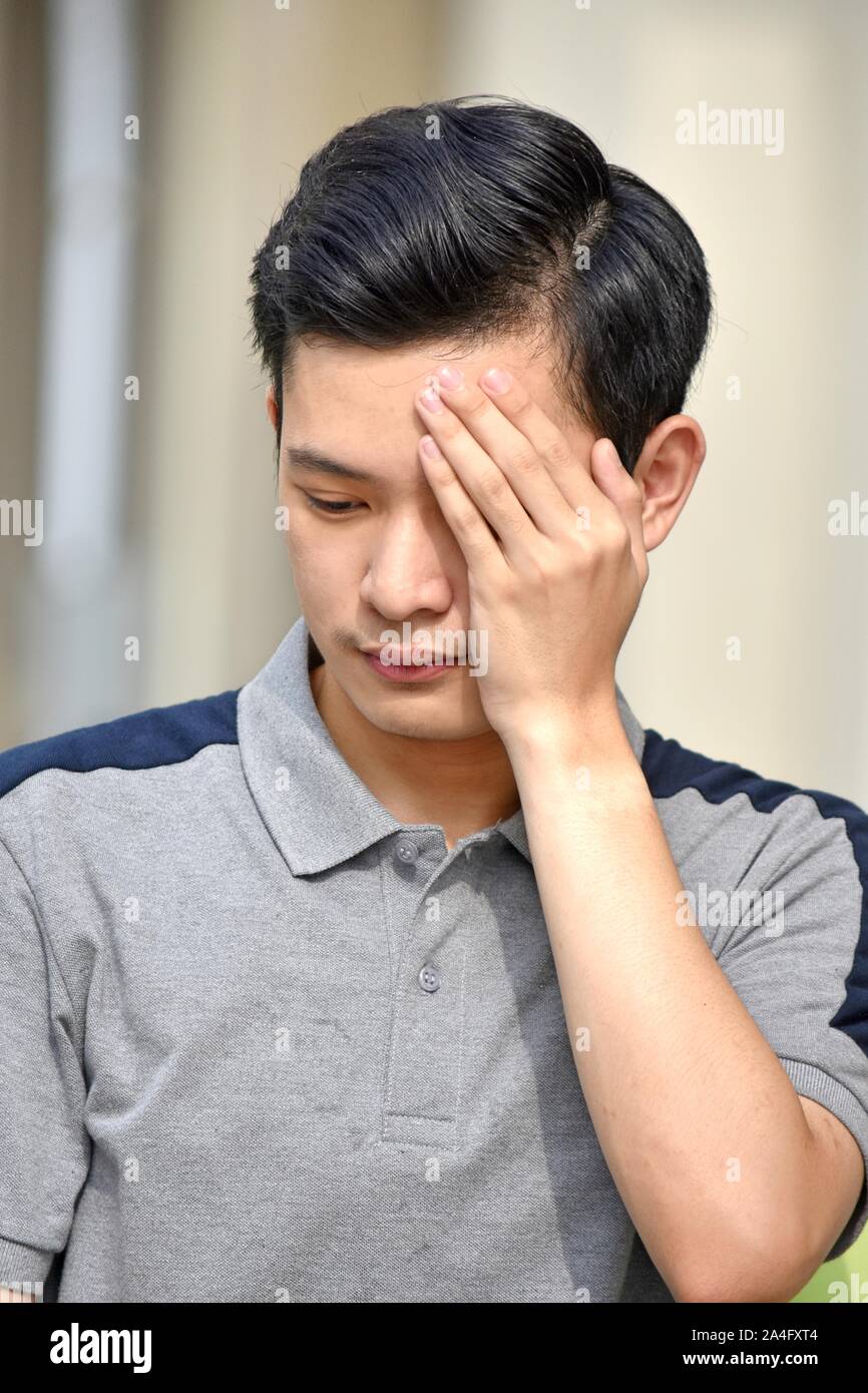 Worrisome Filipino Person Stock Photo - Alamy