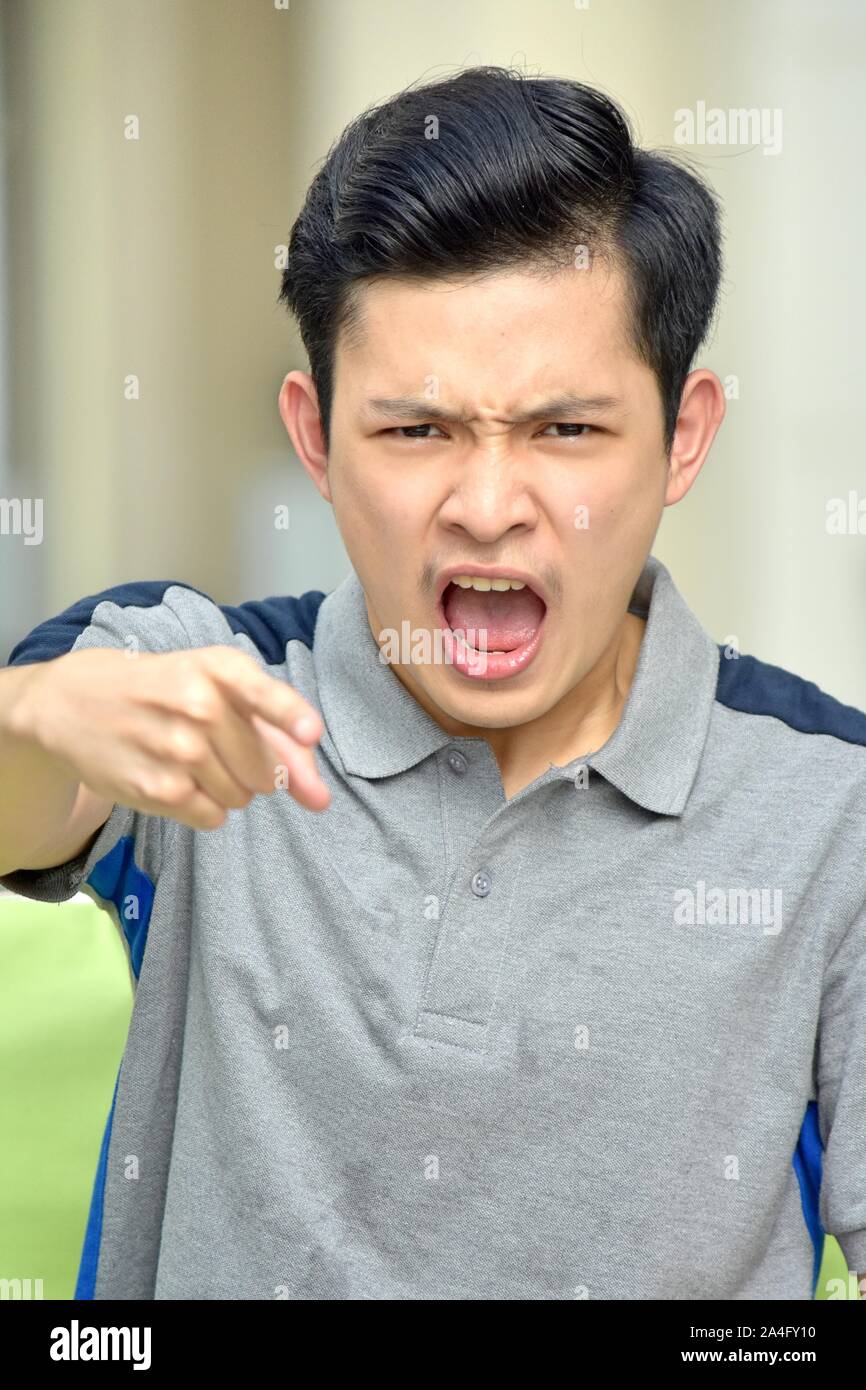 An Angry Good Looking Filipino Person Stock Photo - Alamy