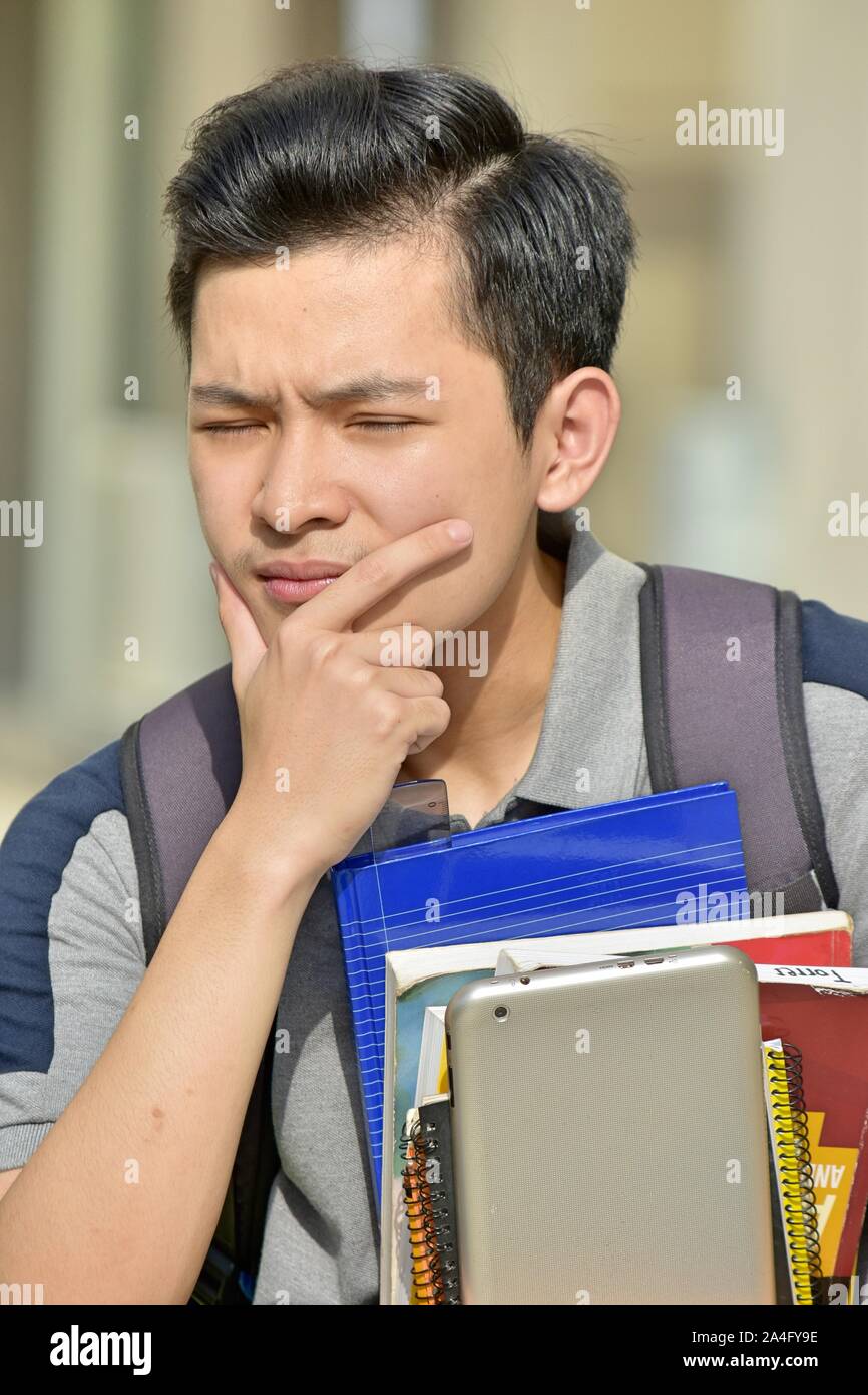 Young Filipino Boy Student Thinking Stock Photo - Alamy