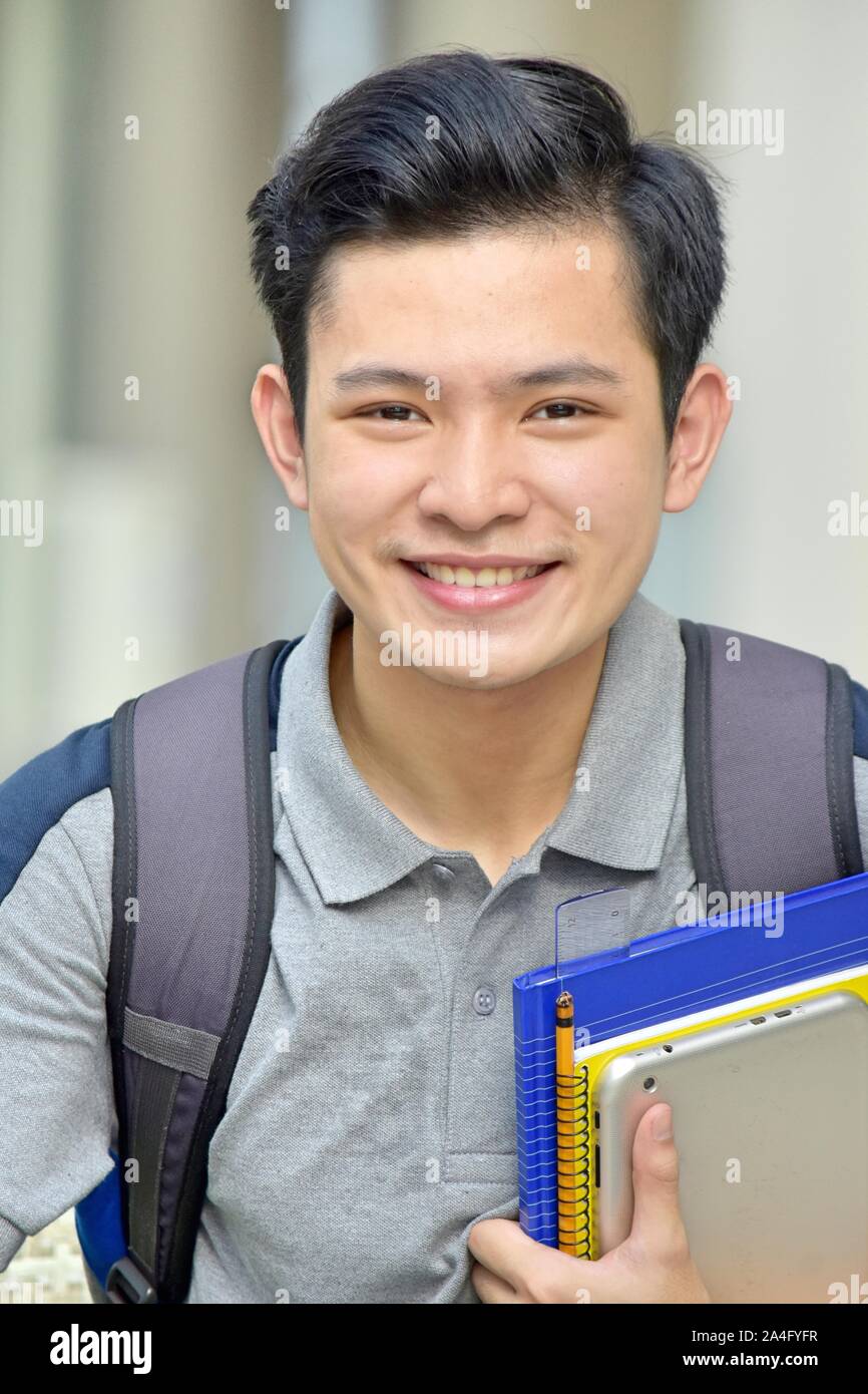 Chinese boy smiling hi-res stock photography and images - Alamy