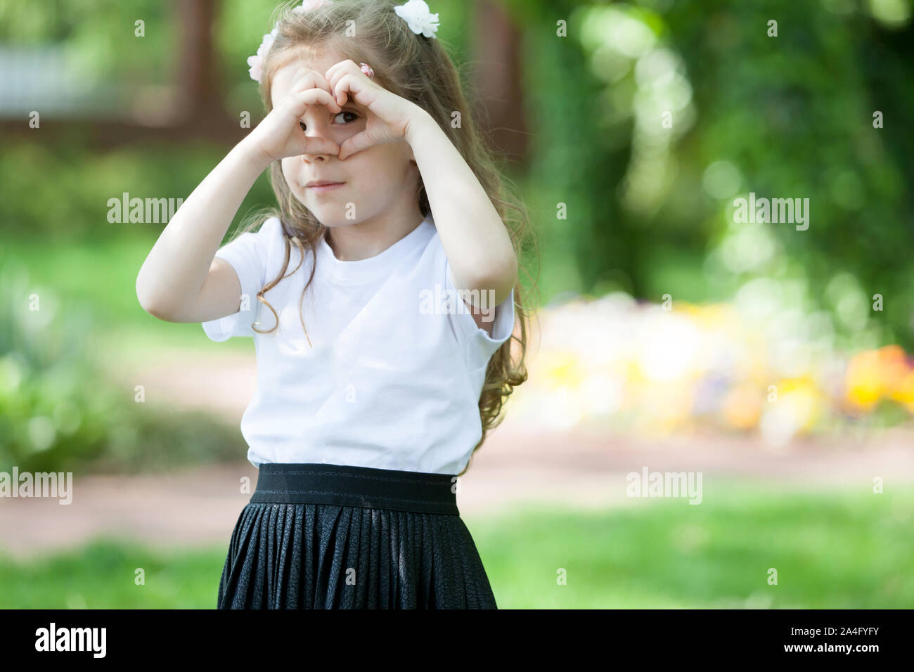 A lovely little girl having quality time in nature Stock Photo - Alamy