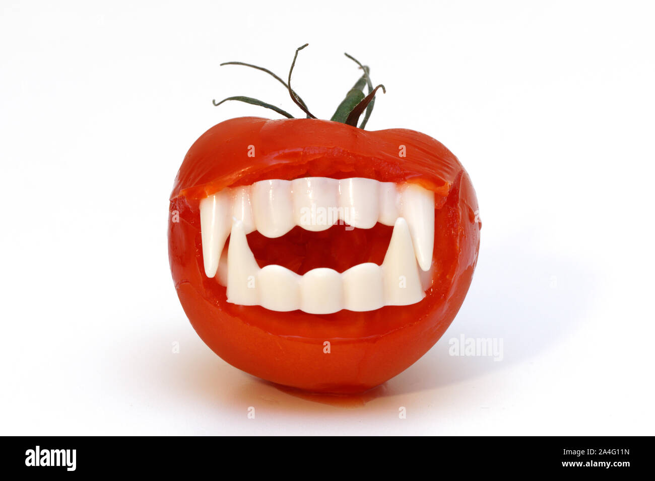 Halloween vampire tomato teeth Stock Photo - Alamy