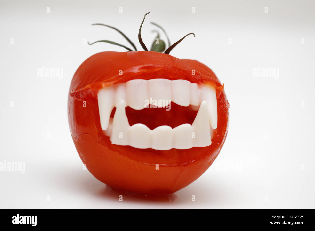 Halloween vampire tomato teeth Stock Photo - Alamy