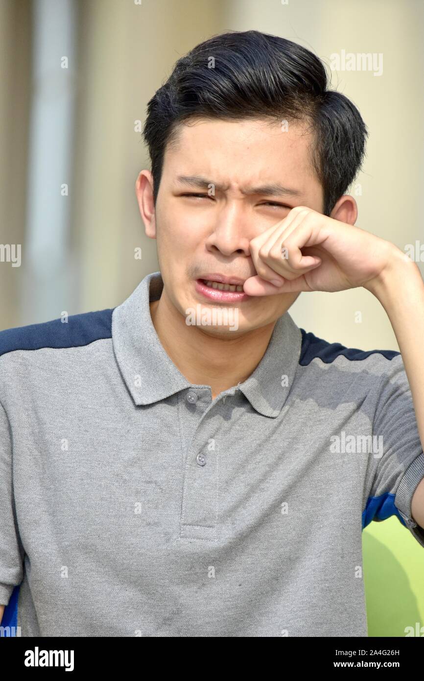 Tearful Teenage Male Stock Photo - Alamy