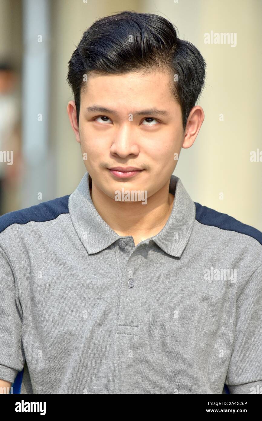 Confused Filipino Boy Youth Stock Photo - Alamy