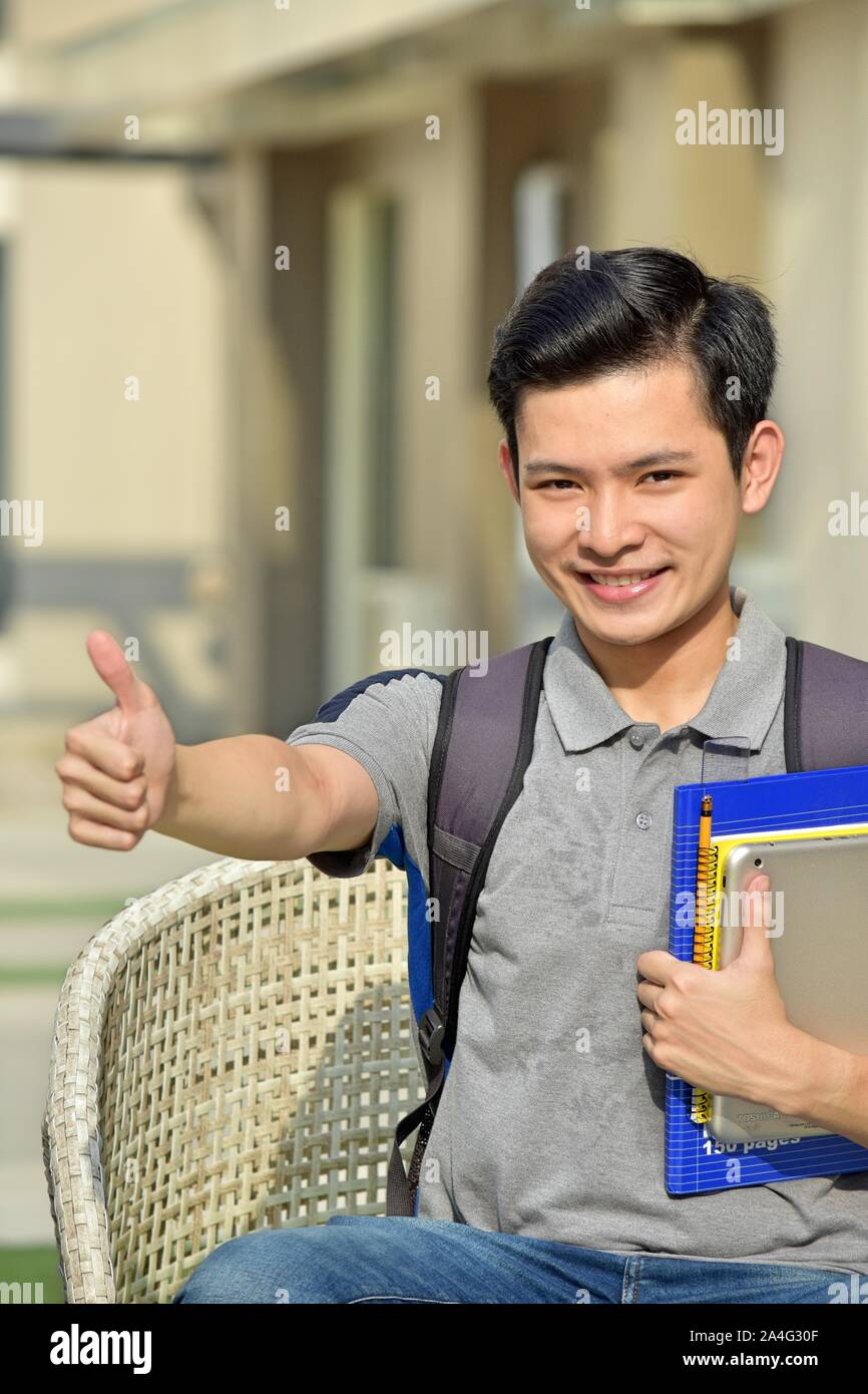 Successful Male Student With Notebooks Stock Photo - Alamy