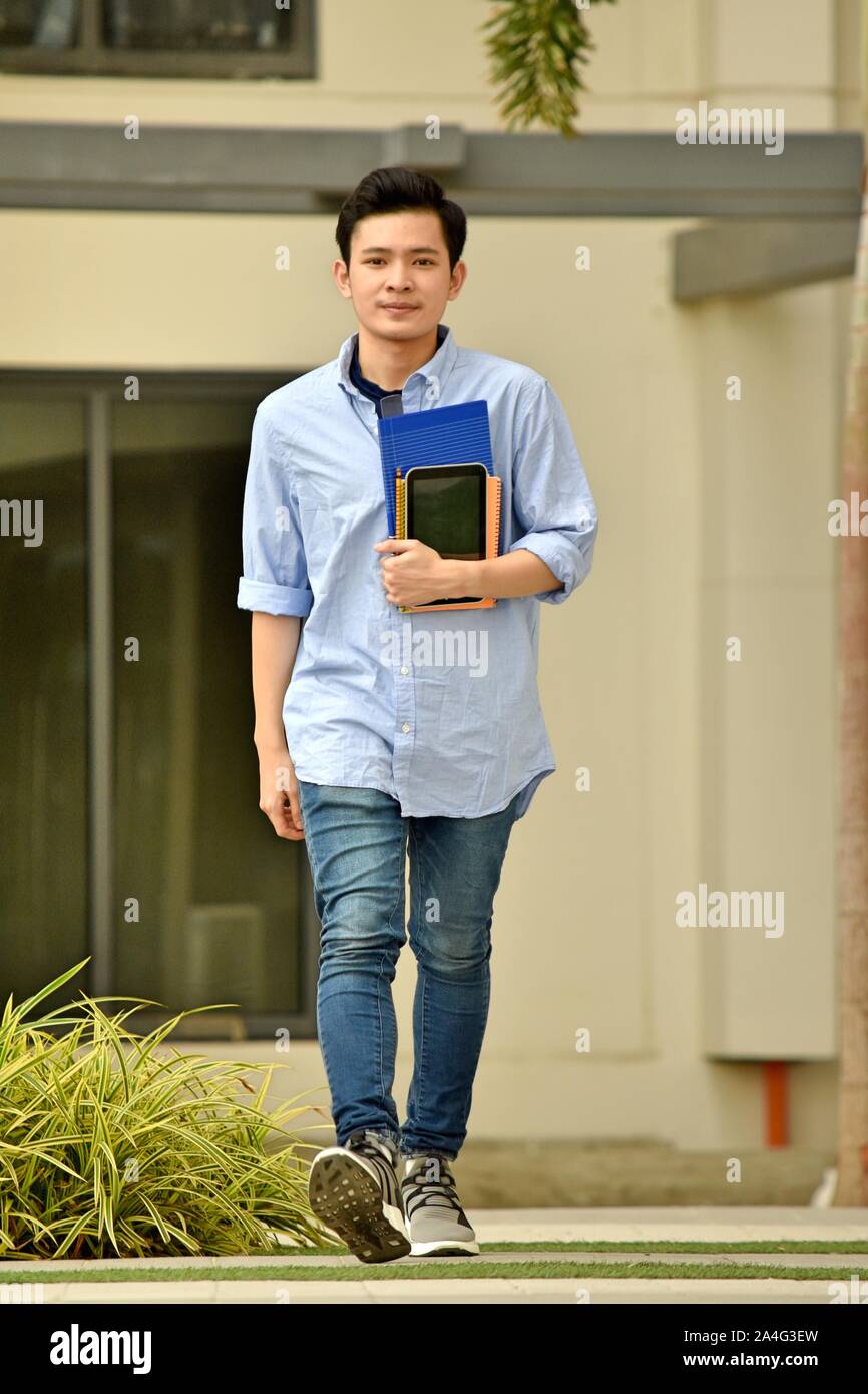 Smart Boy Student Walking Stock Photo - Alamy