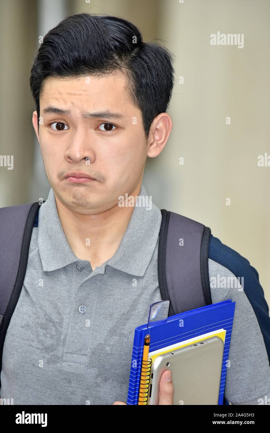 Confused male student hi-res stock photography and images - Alamy