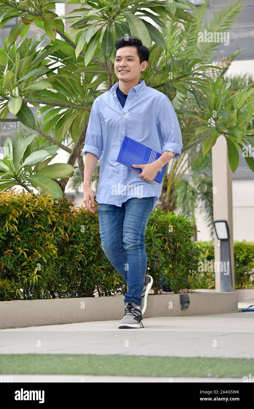 Intelligent Handsome Minority Boy Student Walking On Campus Stock Photo ...