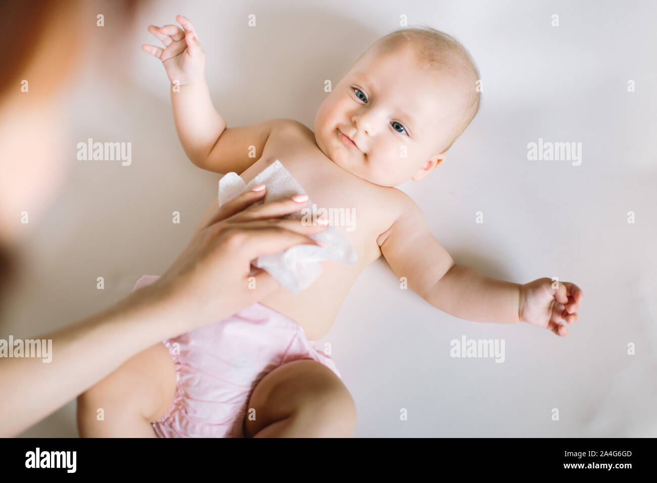 Baby Wiping Eyes High Resolution Stock Photography and Images - Alamy