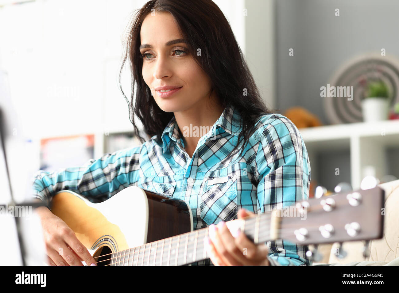 Pretty girl creating new composition Stock Photo - Alamy
