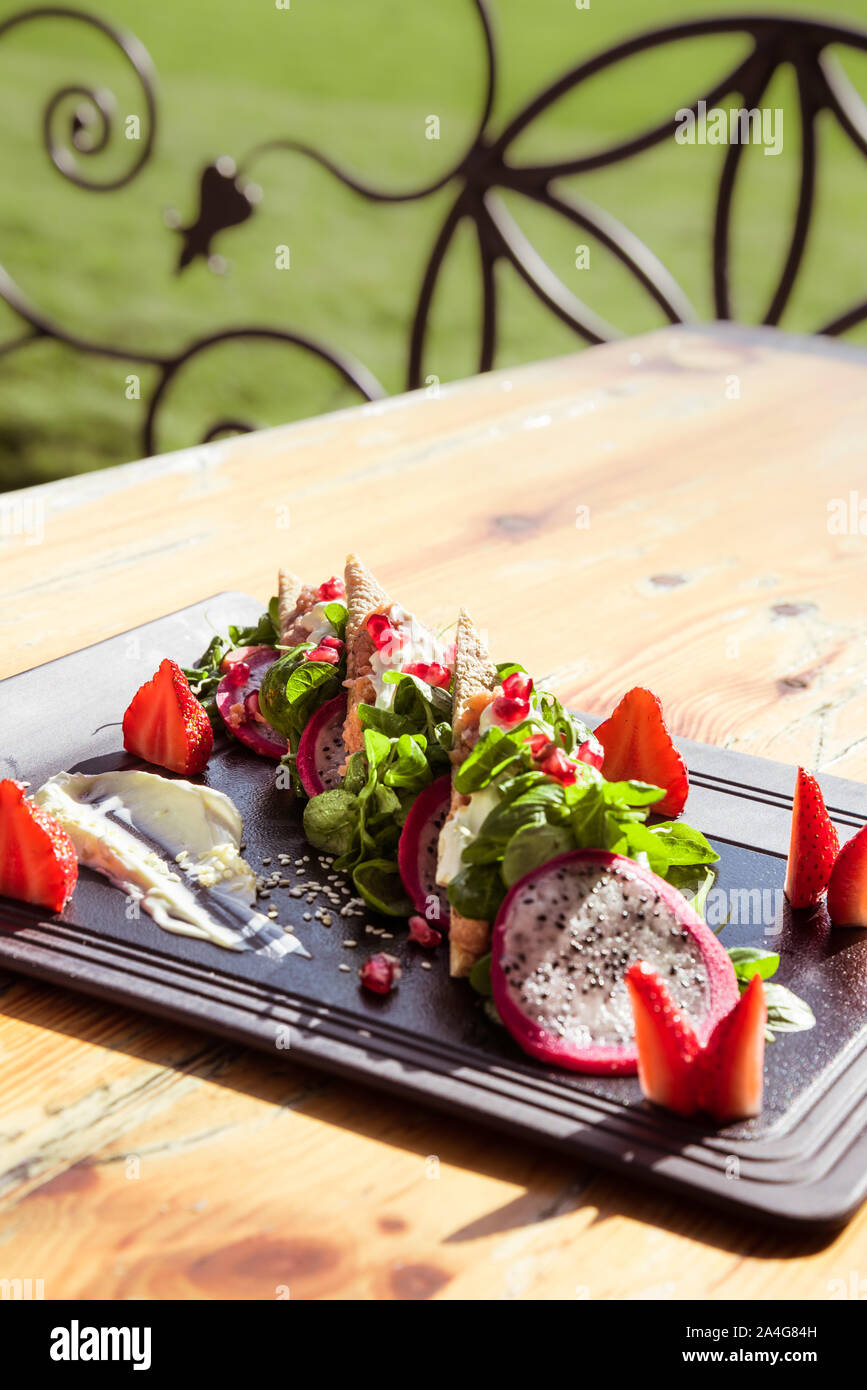Smoked salmon carpaccio on white toast Stock Photo - Alamy