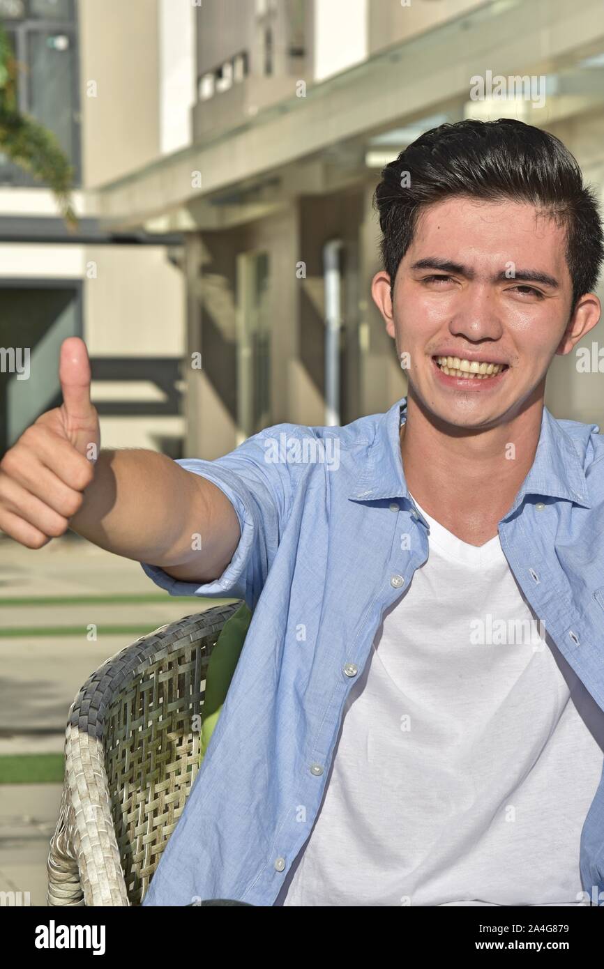 Handsome Filipino Male With Thumbs Up Stock Photo - Alamy