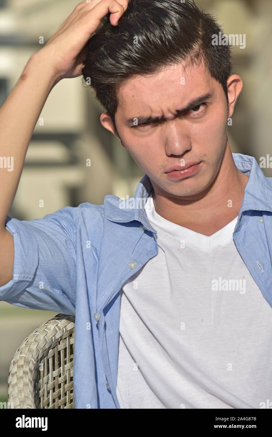 Confused Filipino Person Stock Photo - Alamy