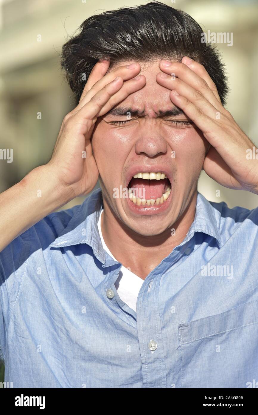 Stressed Handsome Filipino Person Stock Photo - Alamy