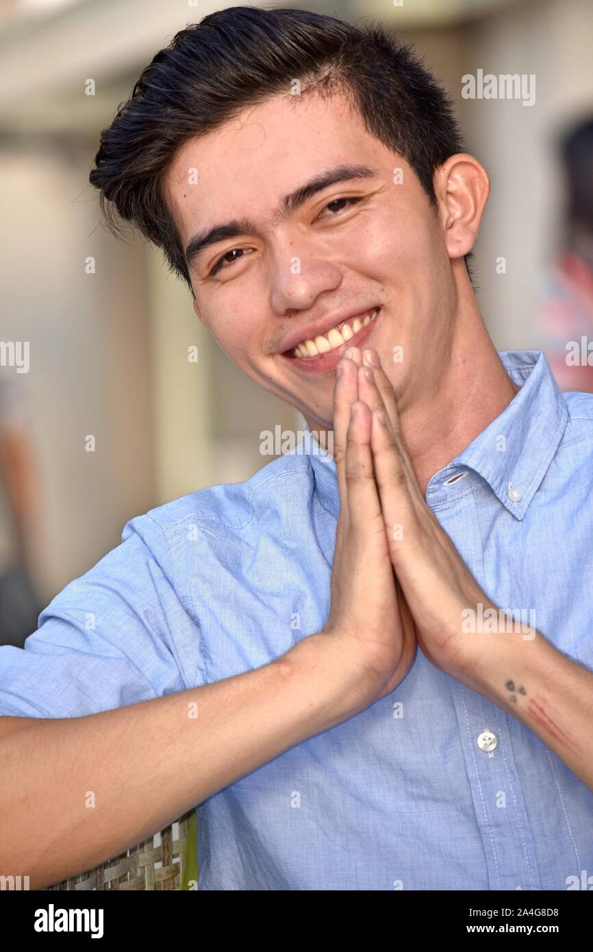 An Asian Male Praying Stock Photo - Alamy