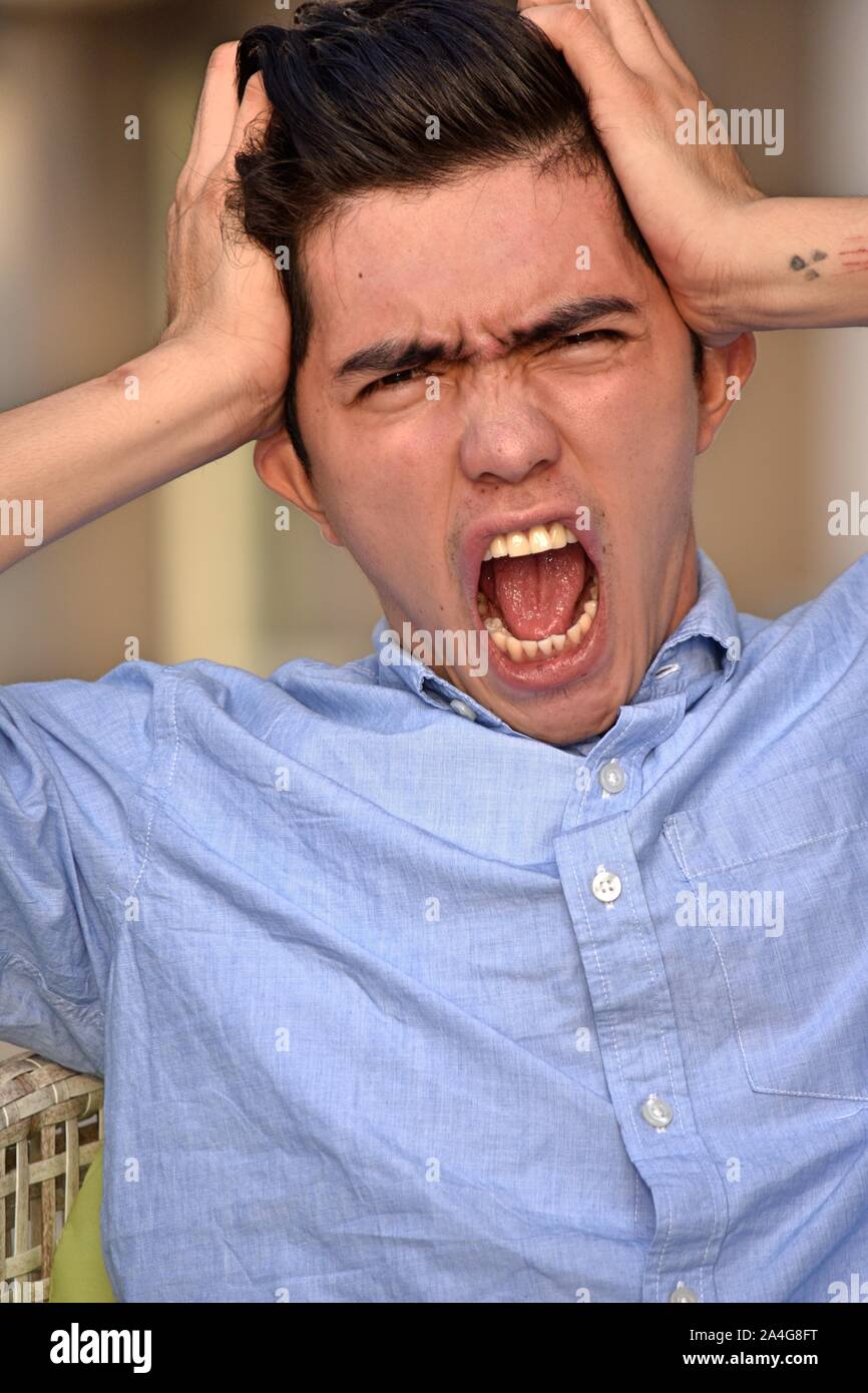 An Anxious Handsome Filipino Person Stock Photo - Alamy