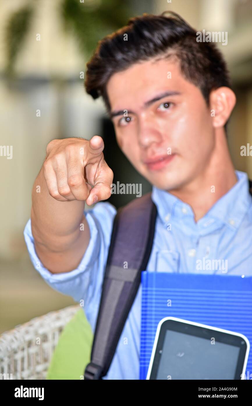 Boy pointing at book hi-res stock photography and images - Alamy