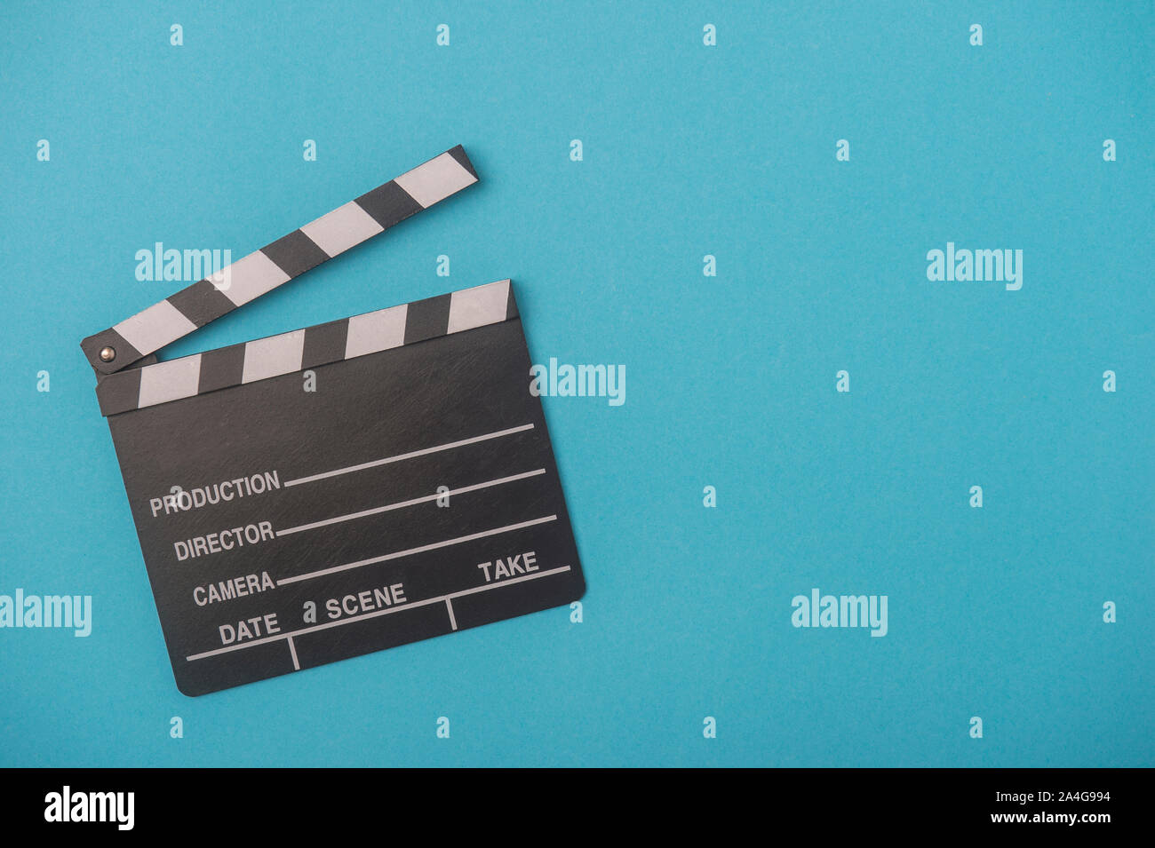 movie clapper on blue background, cinema concept Stock Photo - Alamy