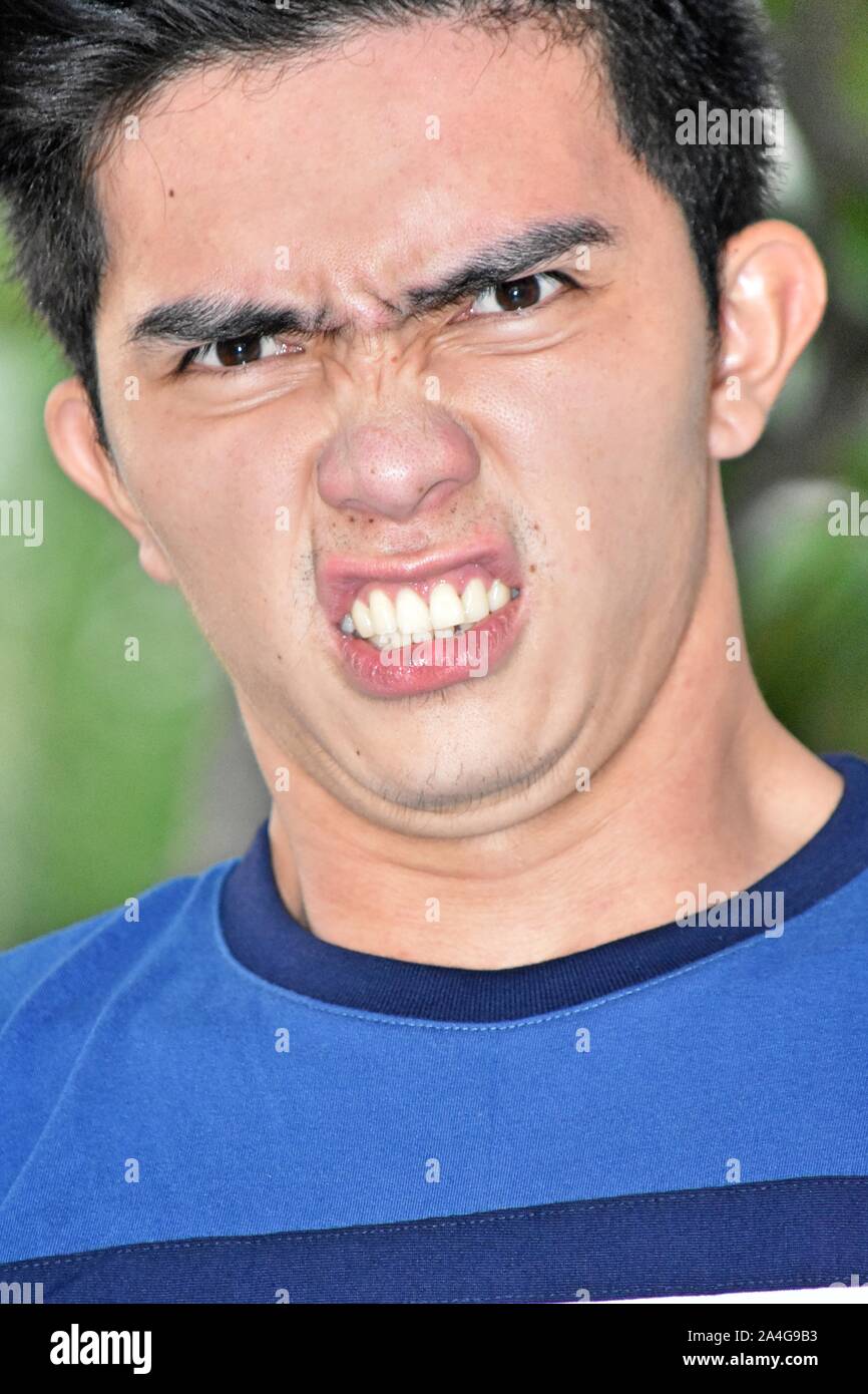 Confused Filipino Male Stock Photo - Alamy