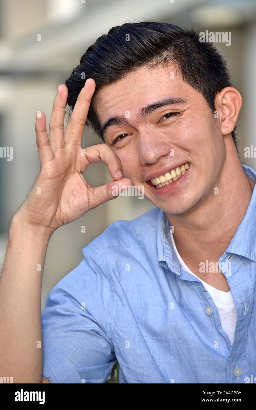 Filipino Male And Okay Sign Stock Photo - Alamy