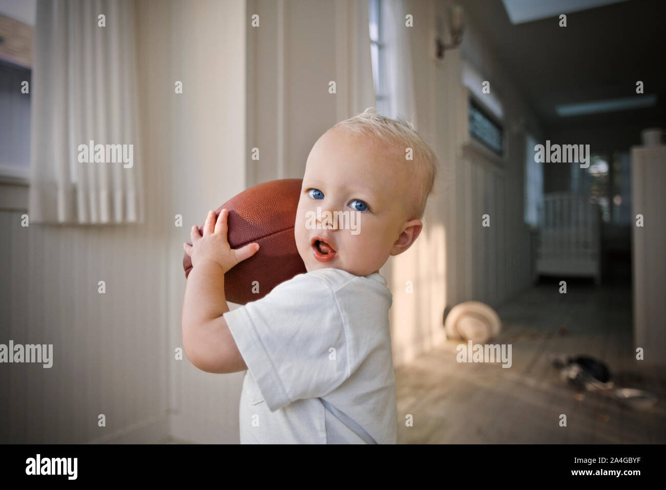 Kids rugby holding hi-res stock photography and images - Alamy