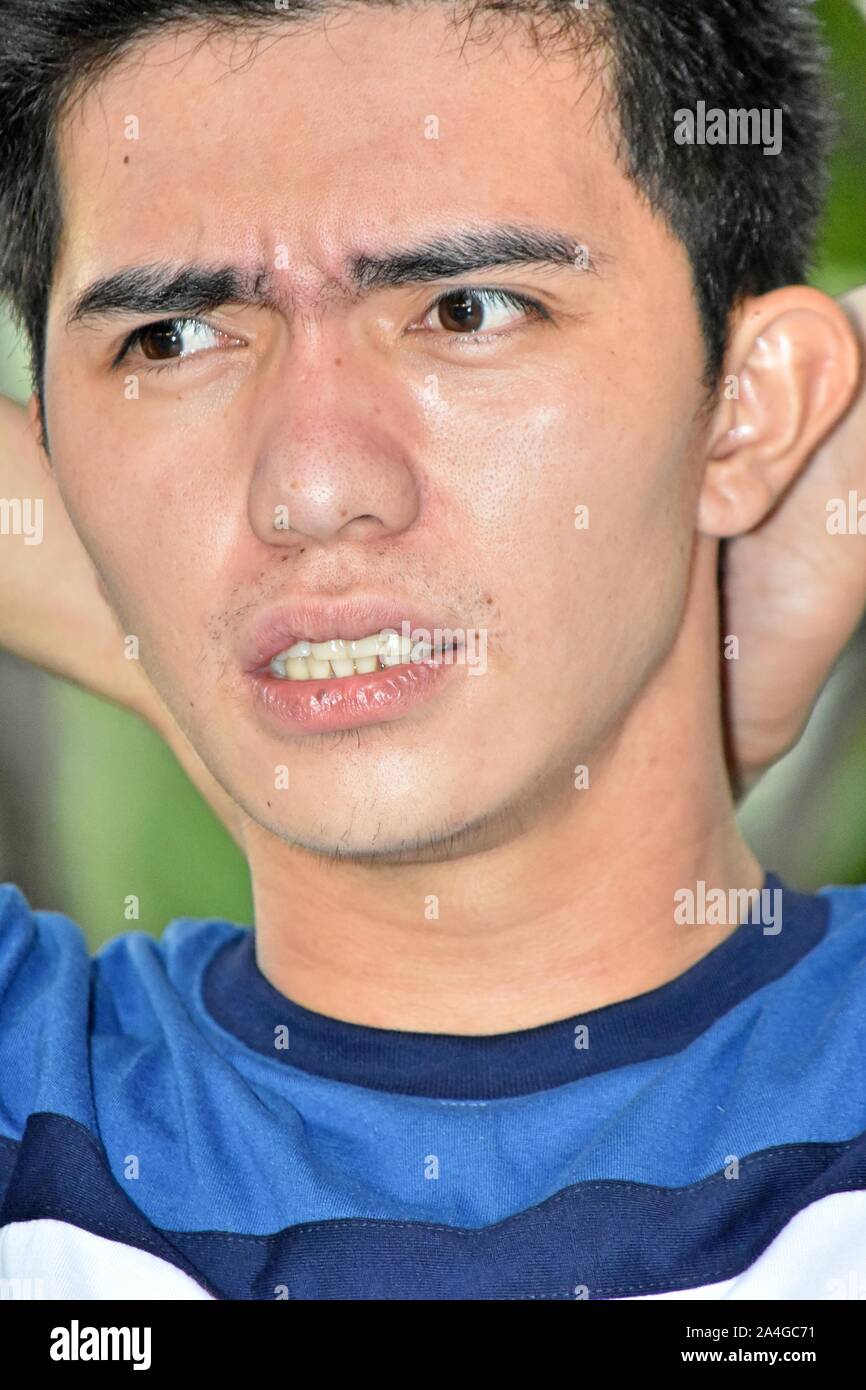 Stressed Filipino Male Stock Photo - Alamy