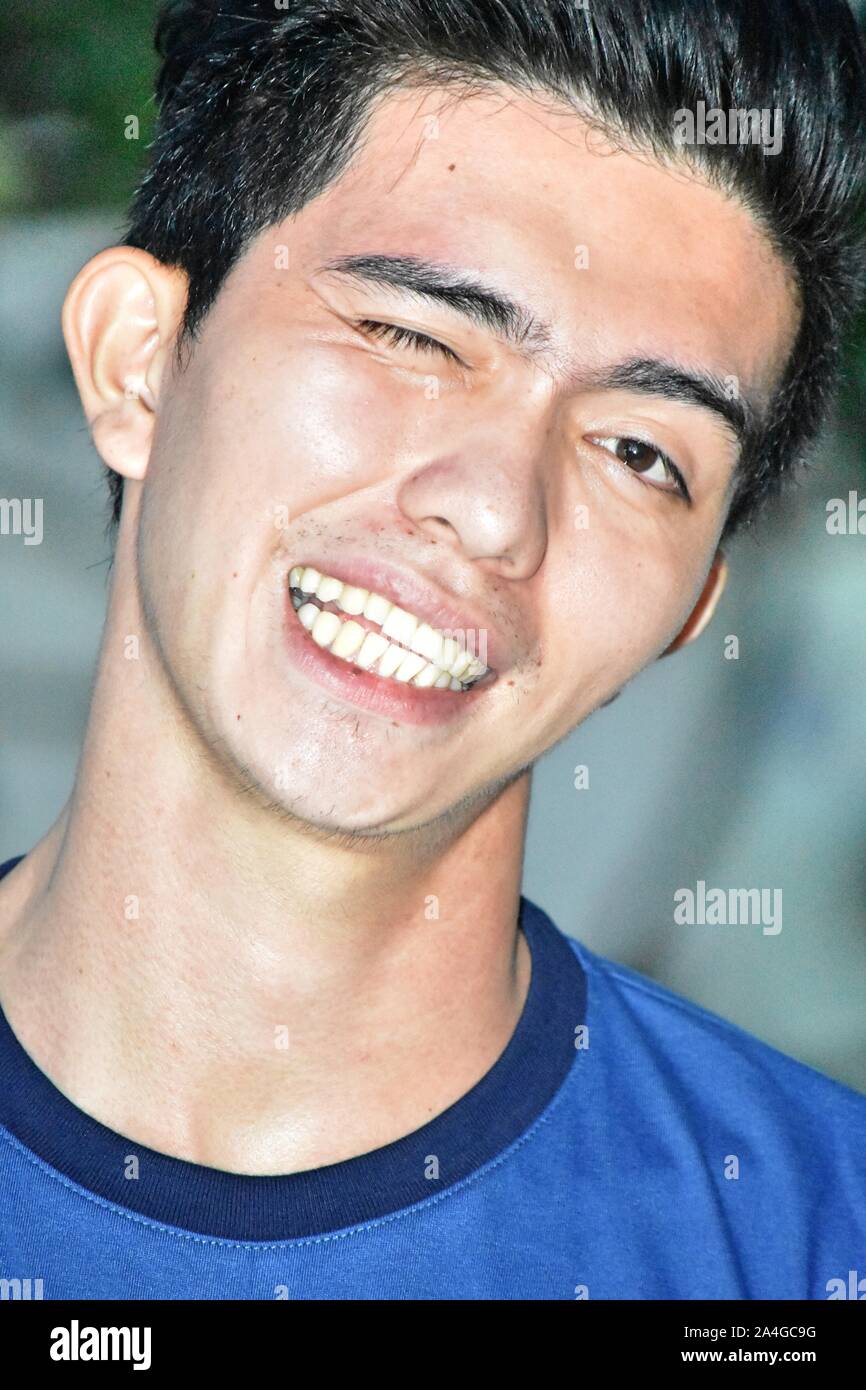 Filipino Male Winking Stock Photo - Alamy