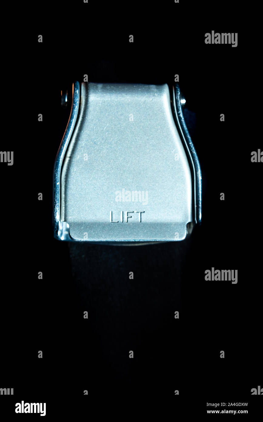 Safety lock of an airplane belt, isolated Stock Photo - Alamy