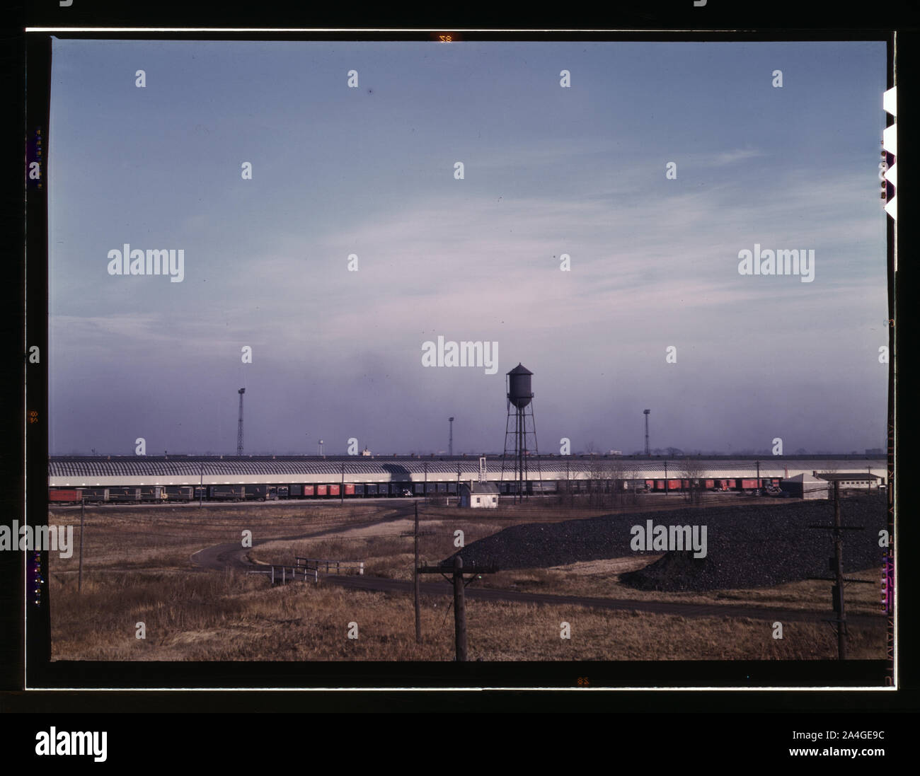 Truck trailers loading and unloading at C & NW RR's [i.e. Chicago and ...