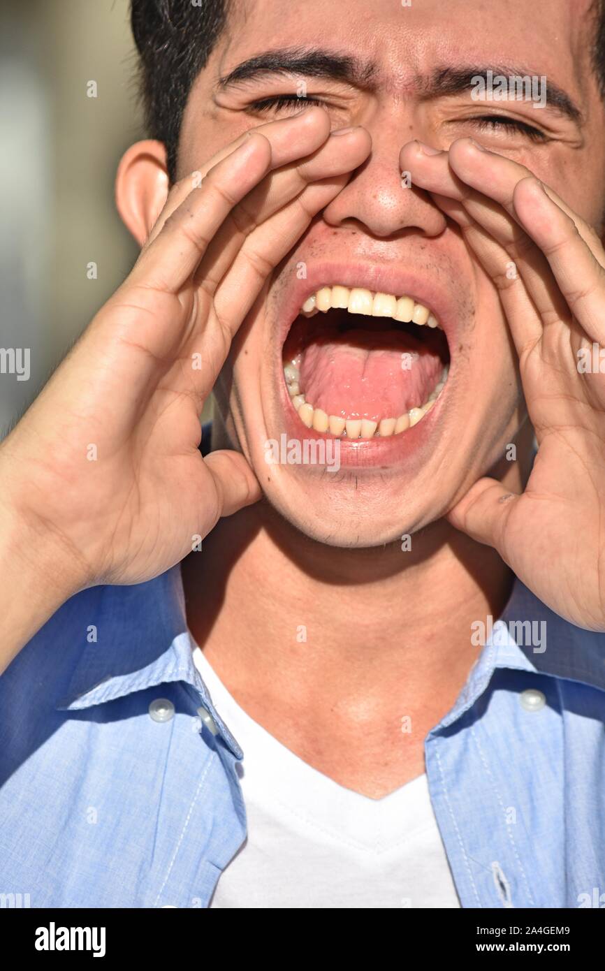 Young Filipino Male Shouting Stock Photo - Alamy