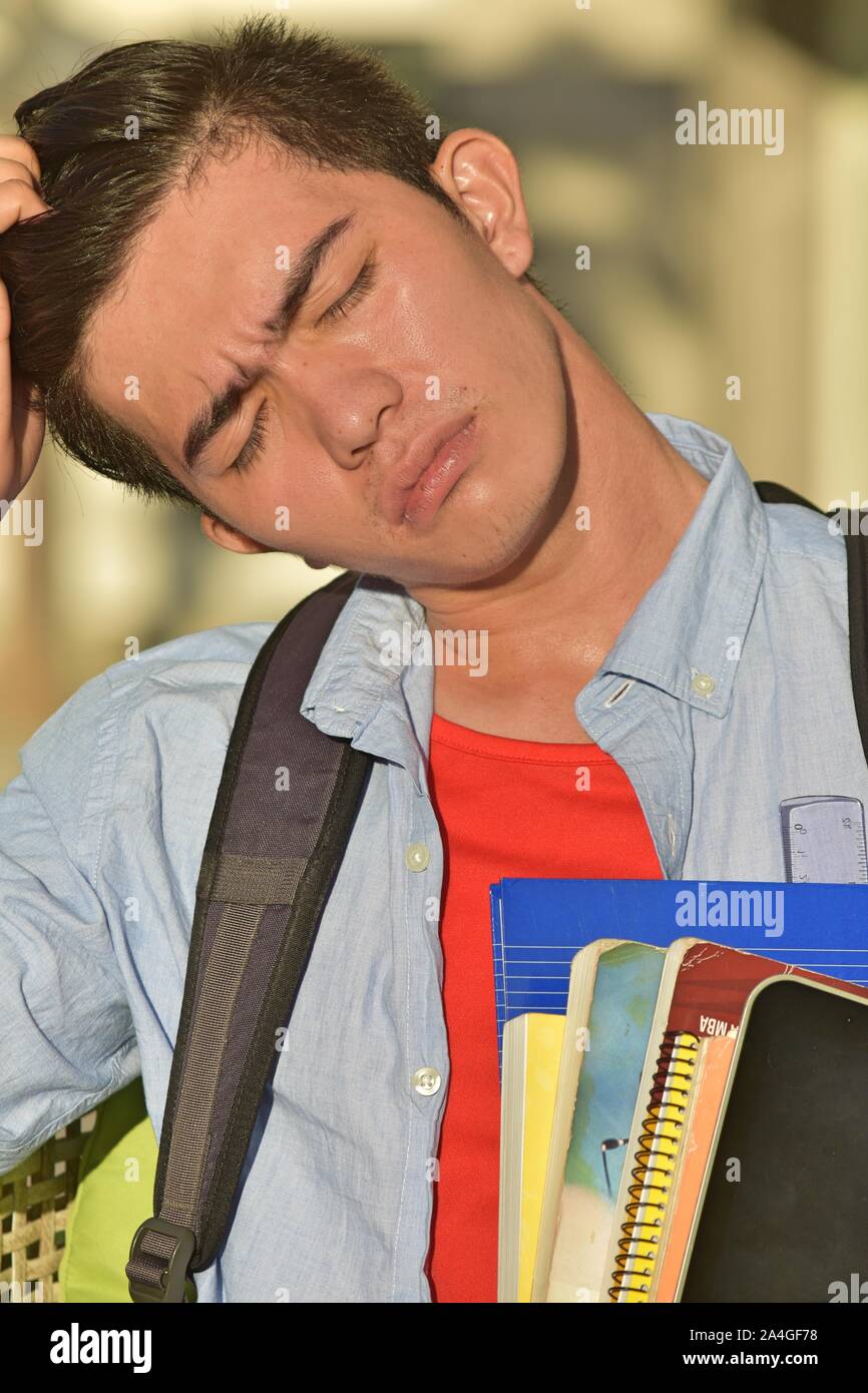 Confused Male Student Stock Photo - Alamy