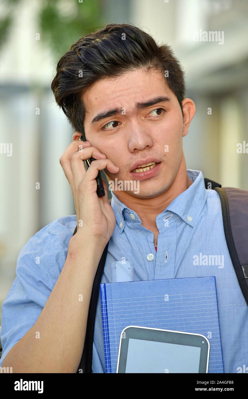 Young Filipino Student Using Cell Stock Photo - Alamy