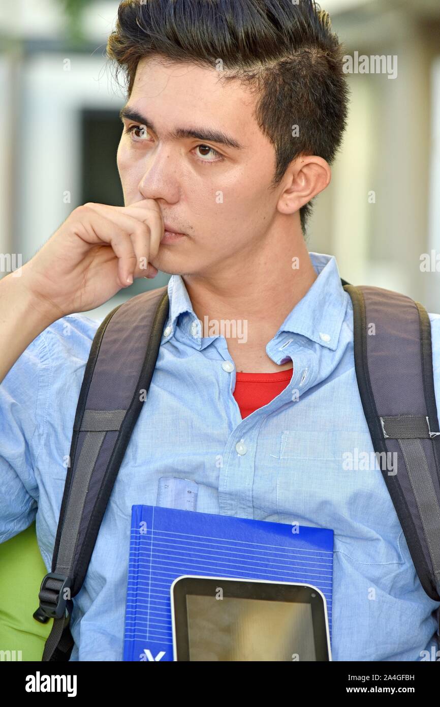 Diverse Male Student Wondering Stock Photo - Alamy