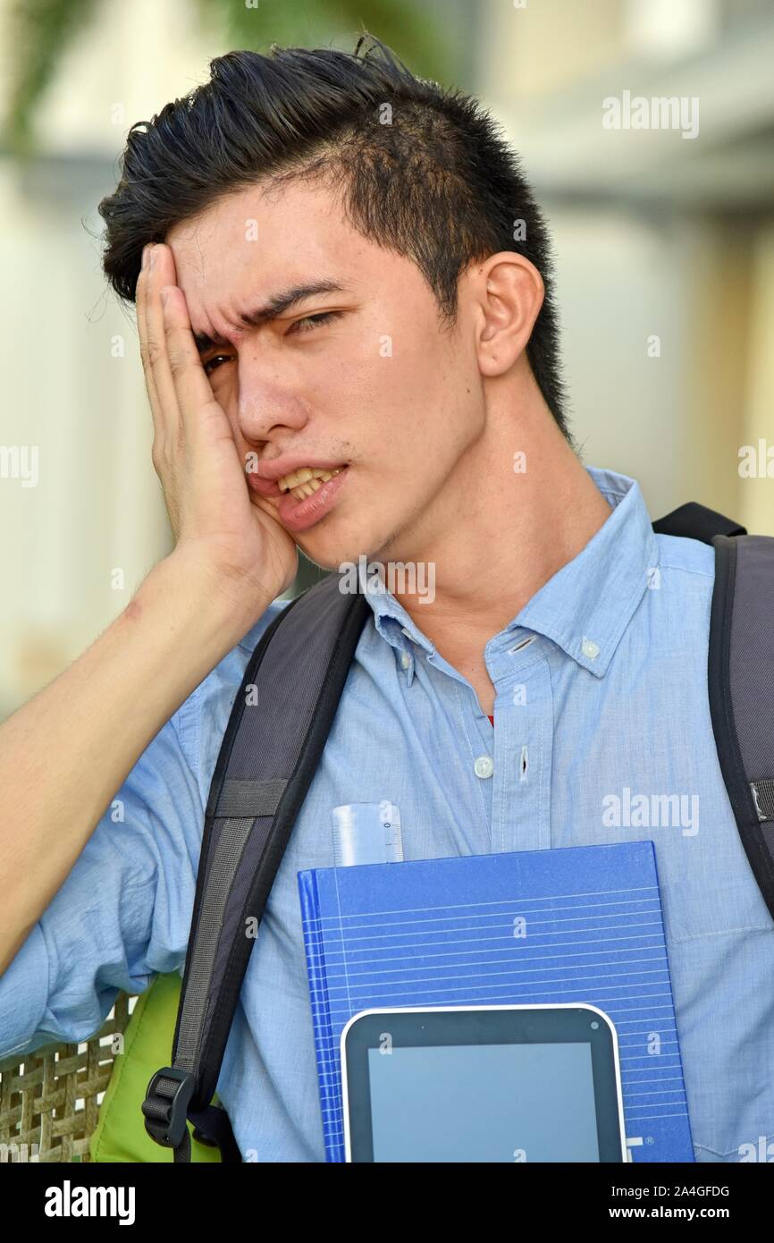 Male Student And Confusion With Notebooks Stock Photo - Alamy