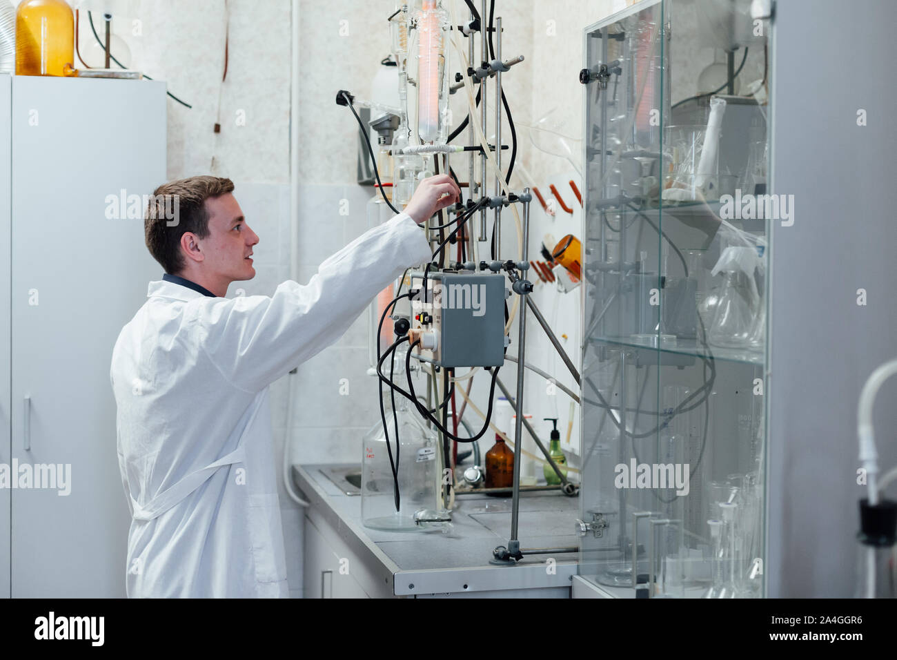 scientist conducts chemical experiments with liquids in the medical ...