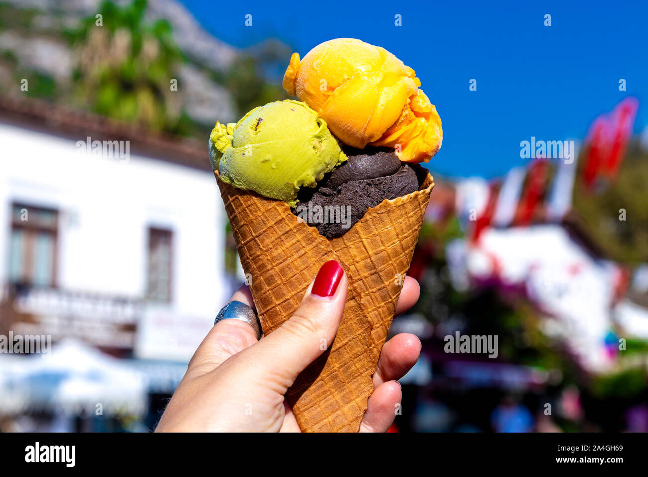 Blue ice cream with chocolate in cone hi-res stock photography and ...