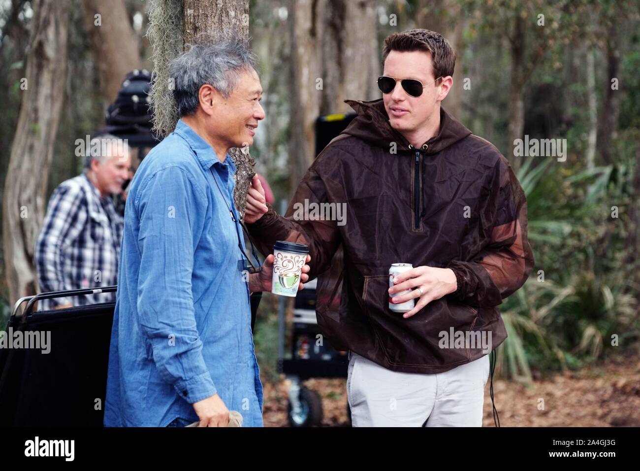 GEMINI MAN, from left: director Ang Lee, producer David Ellison, on-set ...