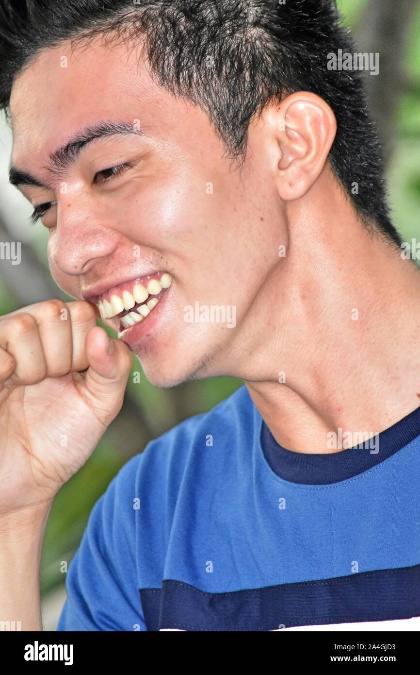 Young Filipino Male And Laughter Stock Photo - Alamy