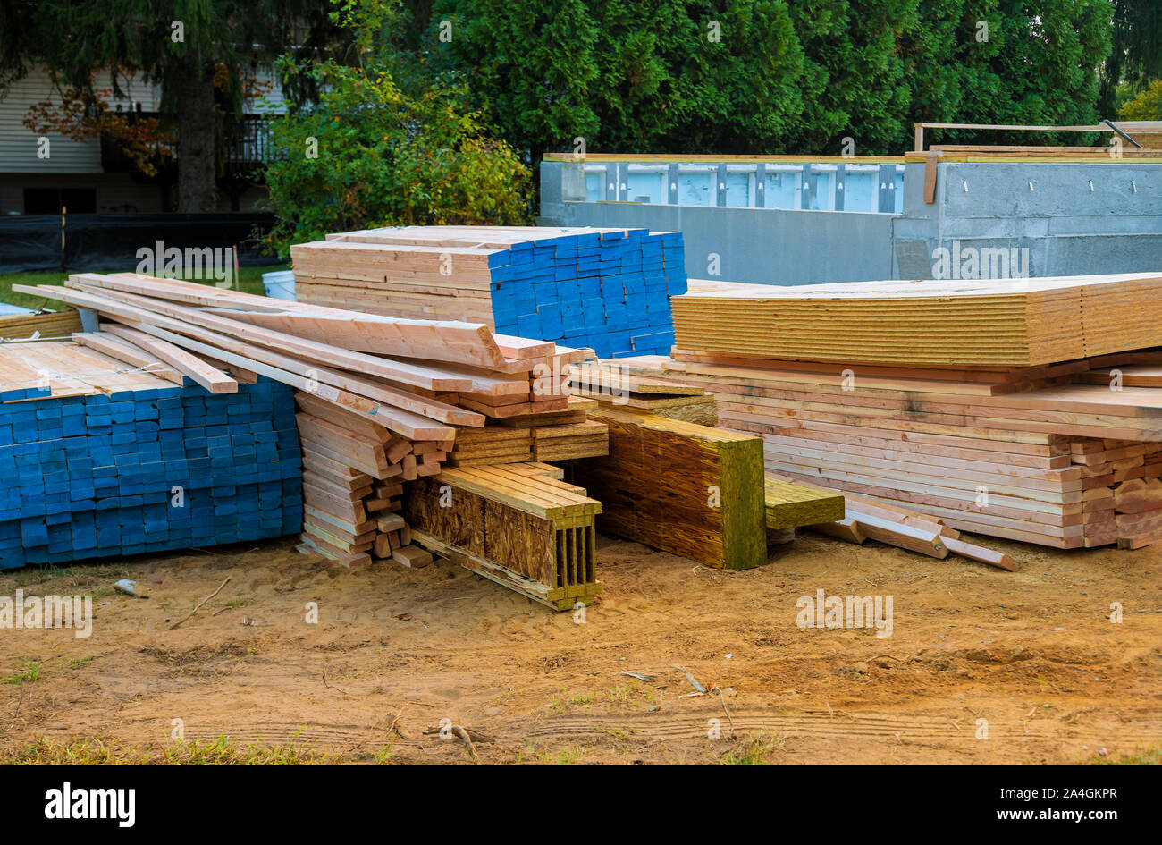Stacked wooden building materials a stack of boards wood frame beam ...