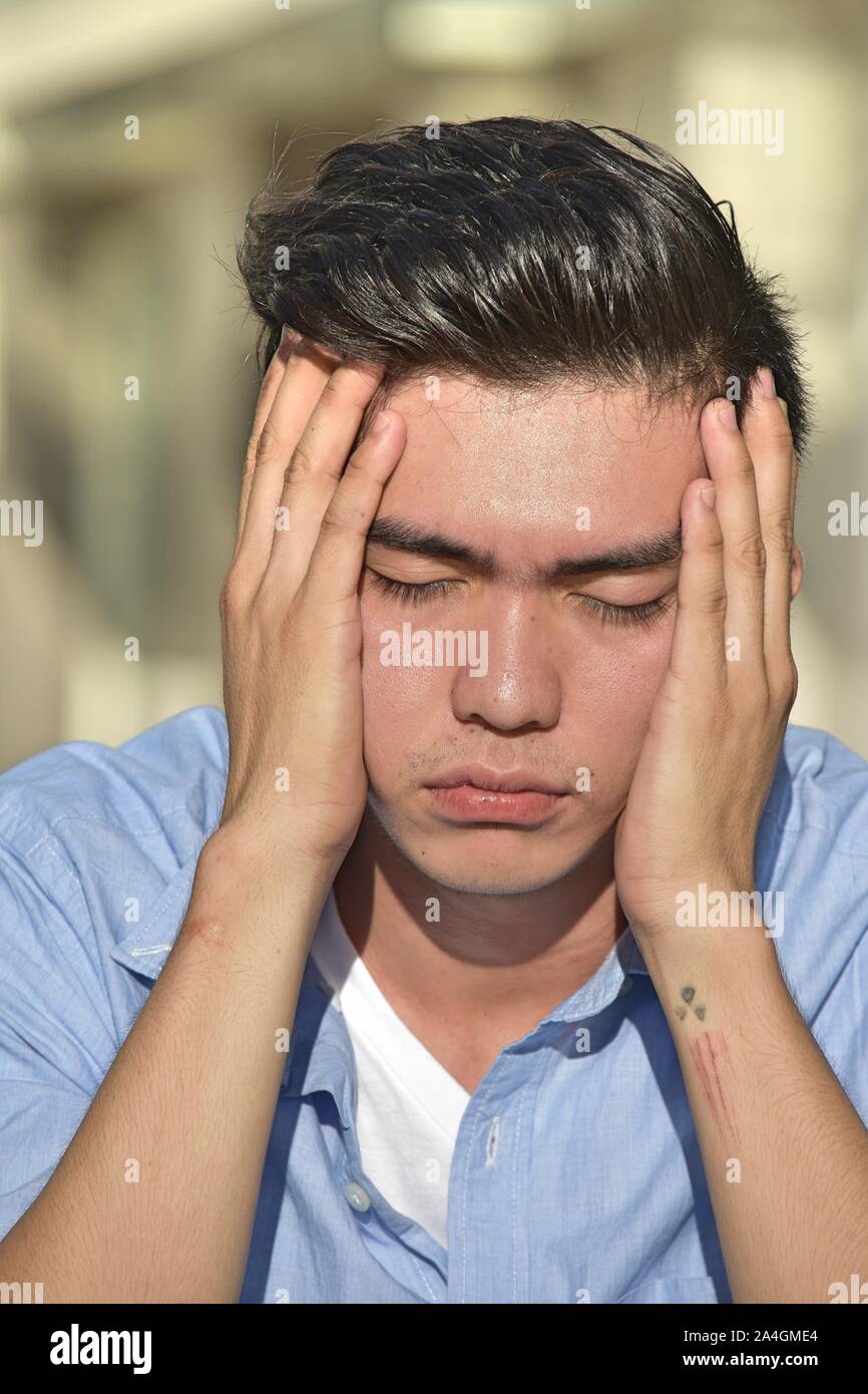 Depressed Young Filipino Person Stock Photo - Alamy