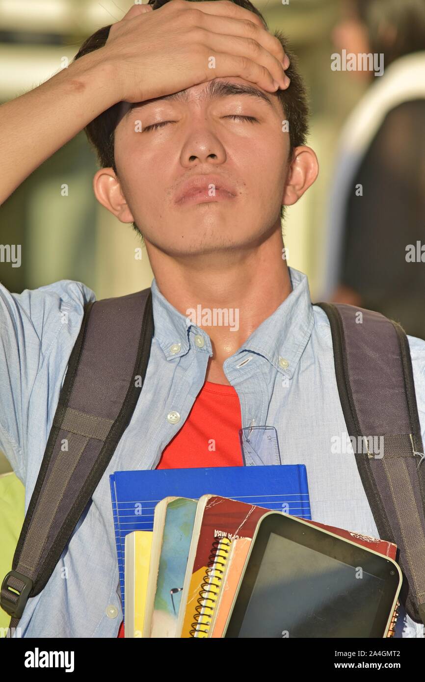 Stressed Male Student Stock Photo - Alamy