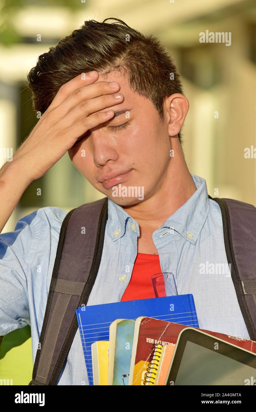 Student And Sadness With Books Stock Photo - Alamy