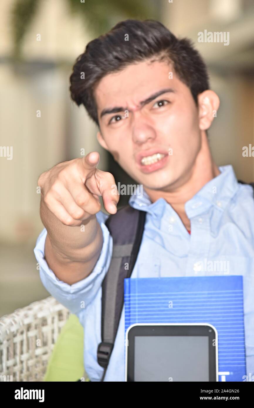An University Minority Male Student Pointing Stock Photo - Alamy