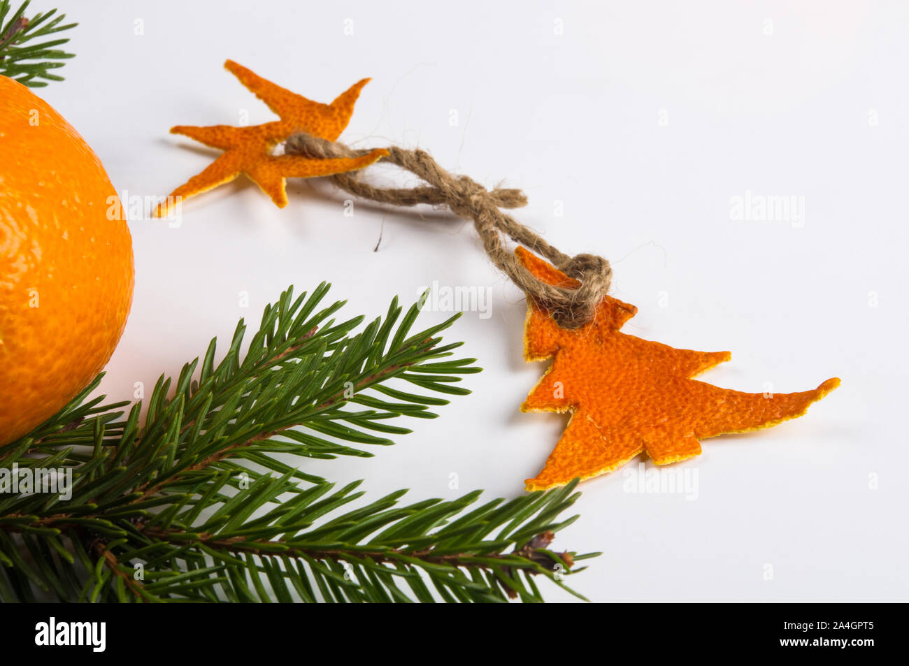 New Year Concept. Christmas decorations from tangerine peel, fir-tree ...