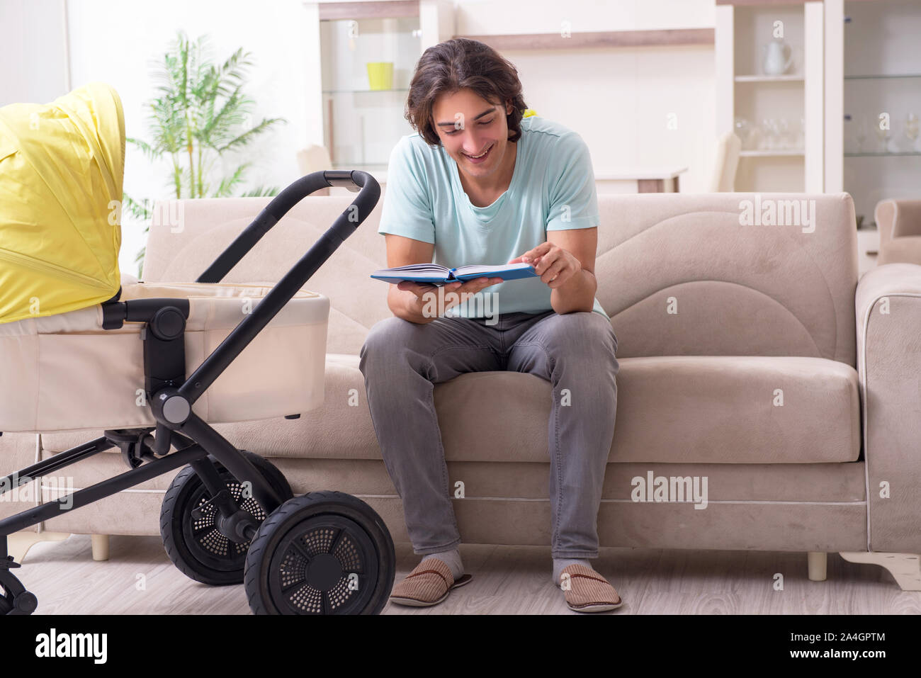 Man babysitting young girl hi-res stock photography and images - Alamy