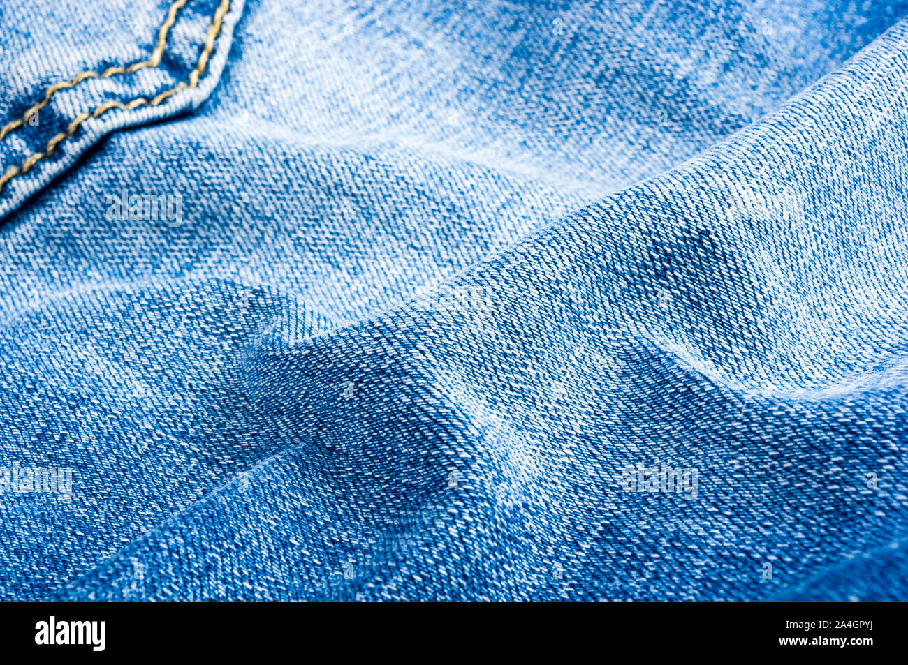 clothing items blue washed faded jeans cotton fabric texture with seams ...